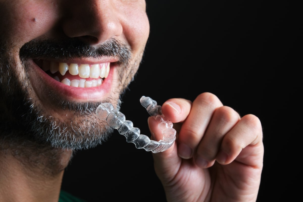 Discreet Orthodontics: How Clear Aligners Correct Bite Issues and ...